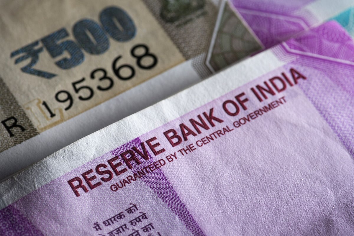 Rupee Opens Little Changed Against A Stronger Dollar