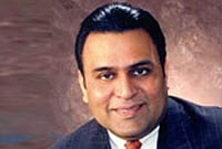 US University Names Business School after Indian-American