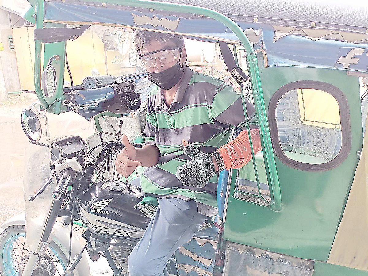 Vision restored, a trike driver pays it forward