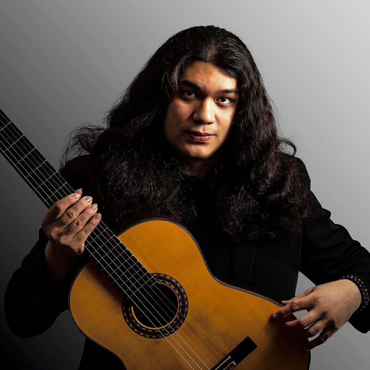 Adrik Cristobal: sterling classical guitarist grapples with dyslexia, adhD
