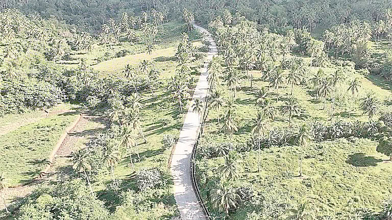 DPWH completes flood control, slope wall, road projects