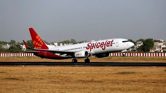 SpiceJet flight turns back mid-air, makes emergency landing in Pune due ...