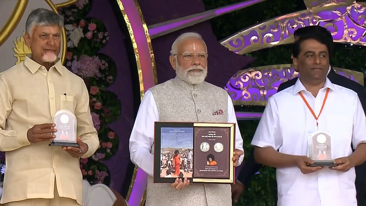 Modi Releases Coin, Stamps Honouring Sathya Sai Baba Legacy