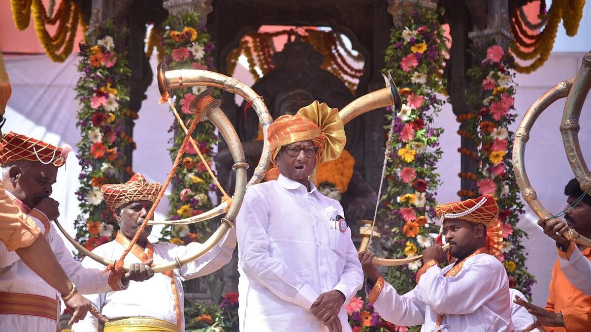 Sharad Pawar unveils ‘man blowing tutari’ symbol of his NCP (SP) group ...