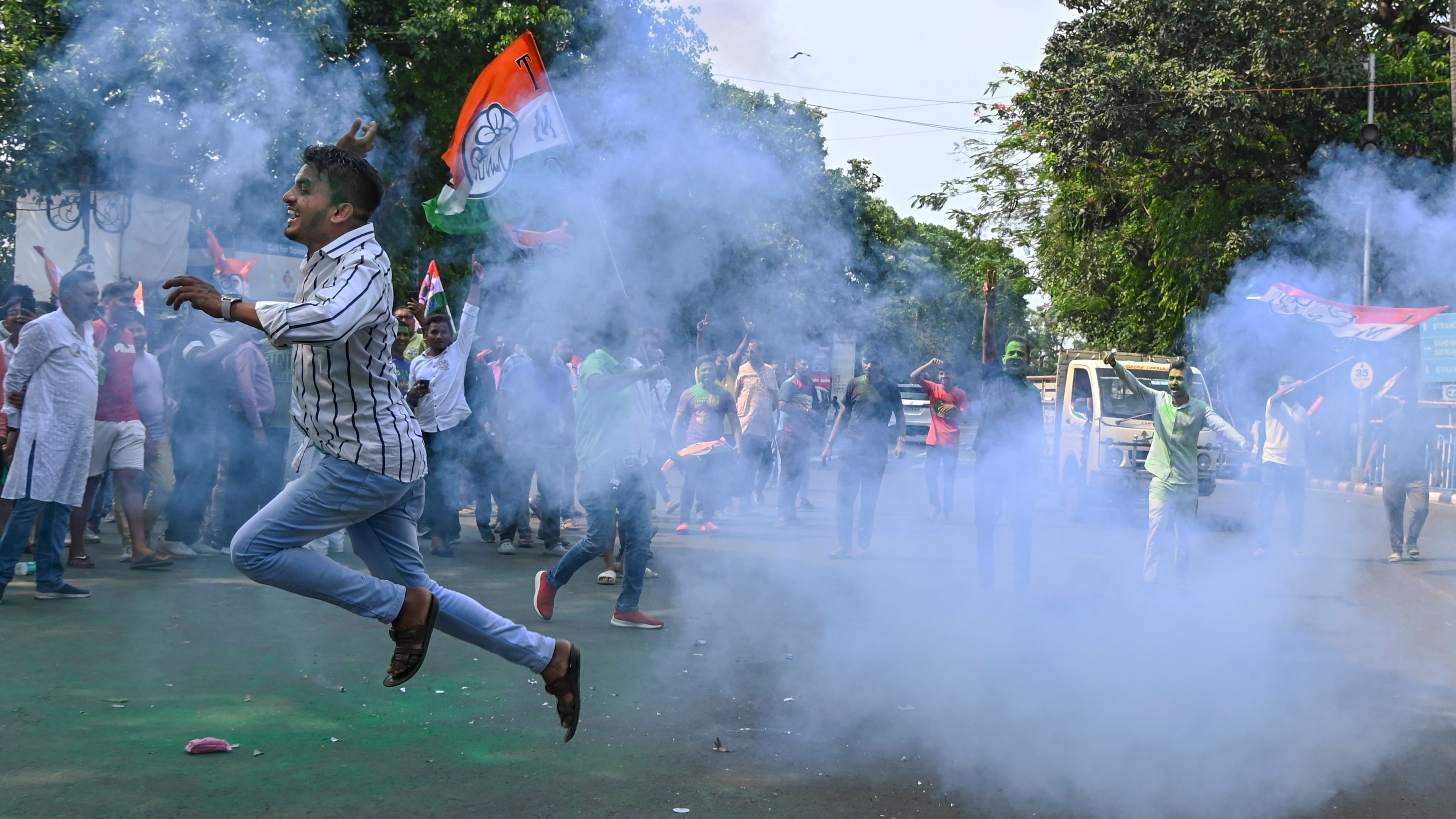 TMC supporters celebrate as party leads in West Bengal; See Pics