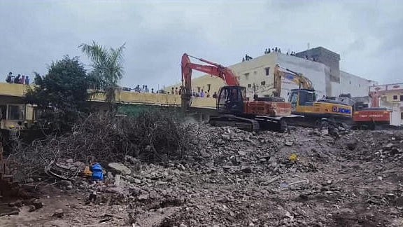 3 including owner booked in Surat building collapse