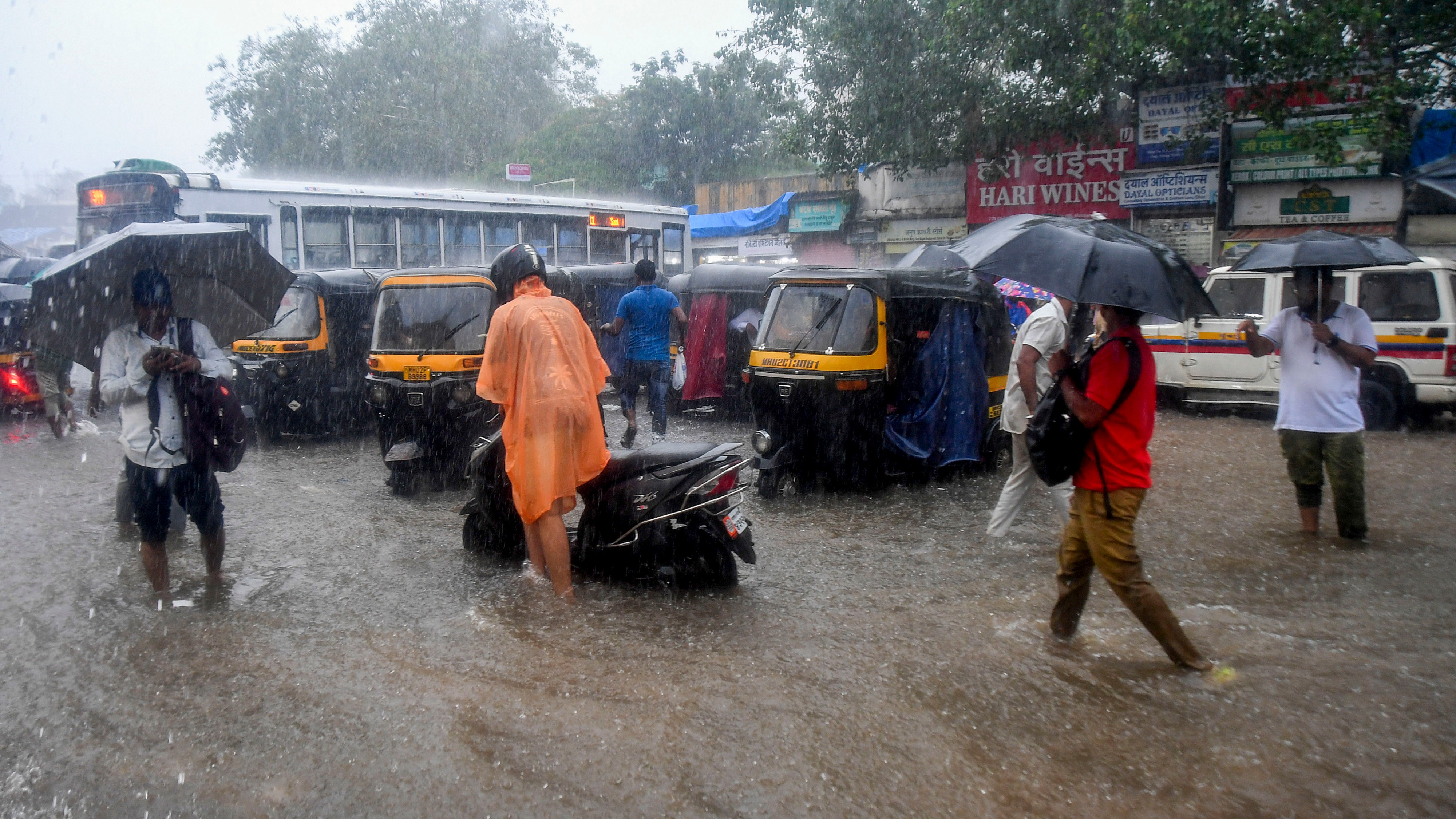 Rains lash Mumbai: Flights, transport hit; IMD issues Red Alert