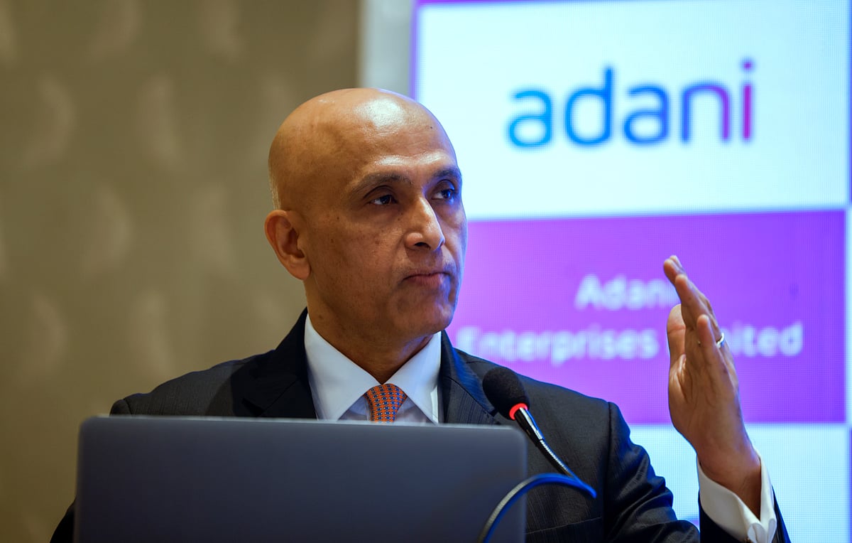 India's Adani Group to raise at least $1.5 billion via dollar bonds ...