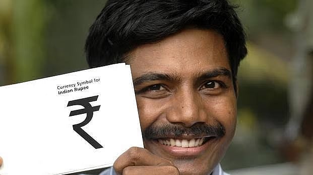 Who is Udaya Kumar, the designer of '₹’ symbol and son of ex-DMK MLA?