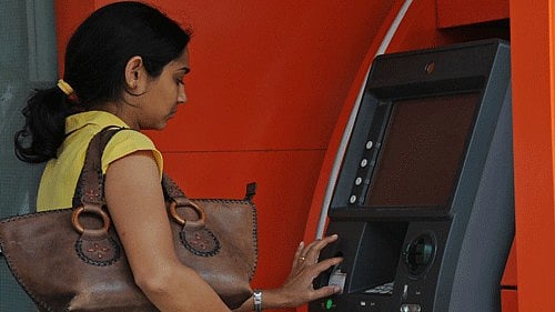 ATM usage cost up by Rs 2 to Rs 23/withdrawal after free monthly usage ...