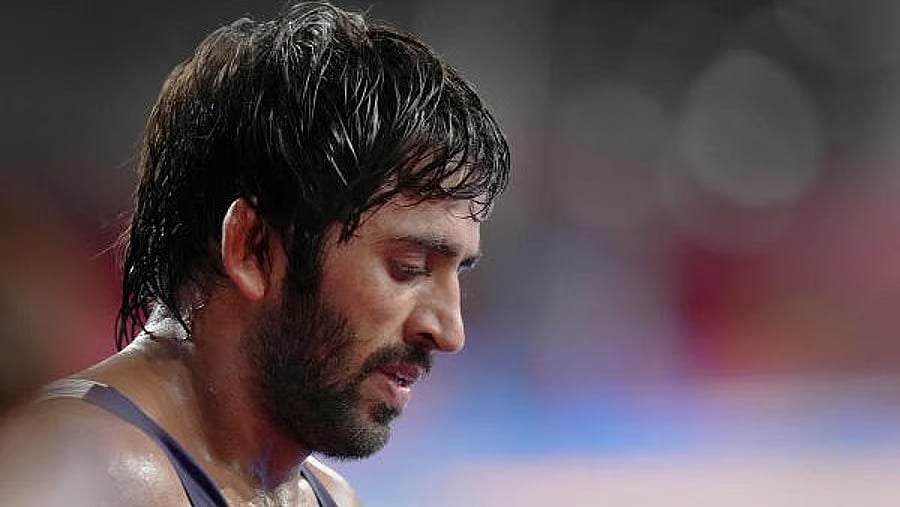 Bajrang Punia tenders unconditional apology for sullying coach Dahiya's ...