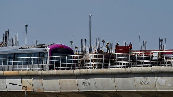 Metal sheets from nearby structures fall on Namma Metro tracks, disrupt ...