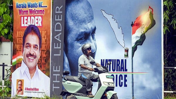 Congress workers in Kerala remove CM campaign posters after high ...