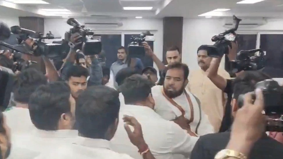 Telangana Congress leader pushes party member to the ground, Minister ...