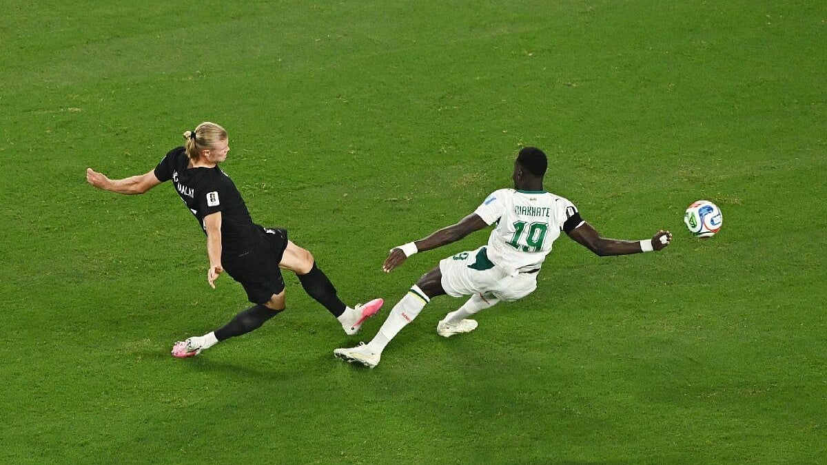 Erling Haaland: Norway beat Senegal 3-2 to reach World Cup knockouts