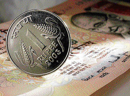 Rupee at 1-mth high, up 161 paise to 61.77 on US Fed decision