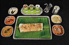 Gold dosa on a silver platter