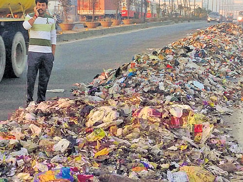 Waste dumped for 200 mtrs on KR Puram flyover