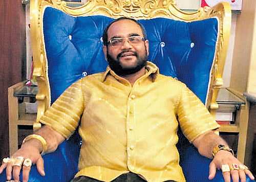 'Gold' man glitters his way to Guinness Book