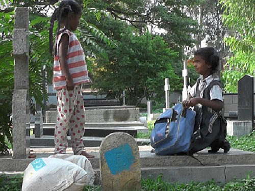Children of gravediggers at Kalpalli cemetery