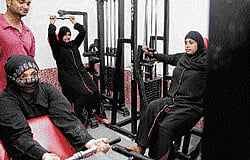 Women in burqa work out for fit, strong bodies