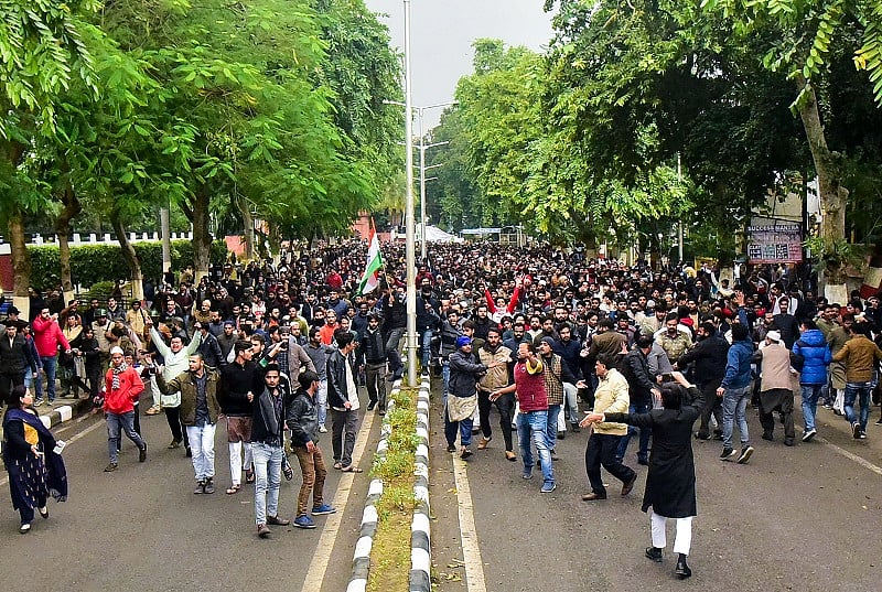 AMU students protest against CAA, cops use teargas