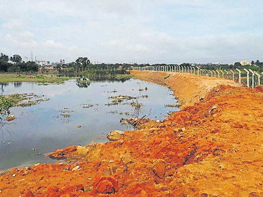 Threat to Varthur lake from debris, soil being dumped for 'road'