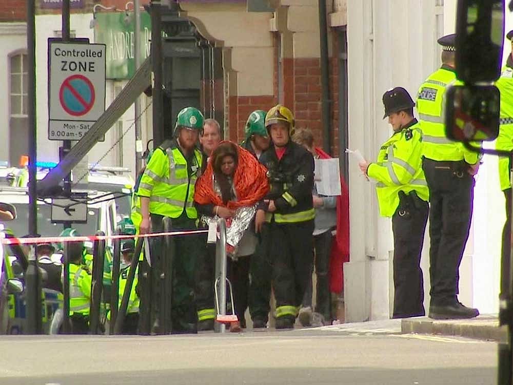 British police raid home after train attack arrest