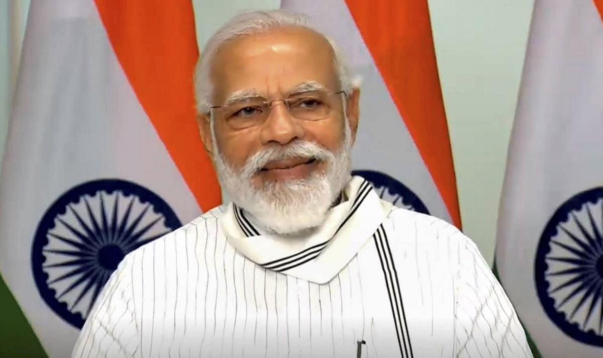 PM Narendra Modi greets people on Puri Jagannath Yatra