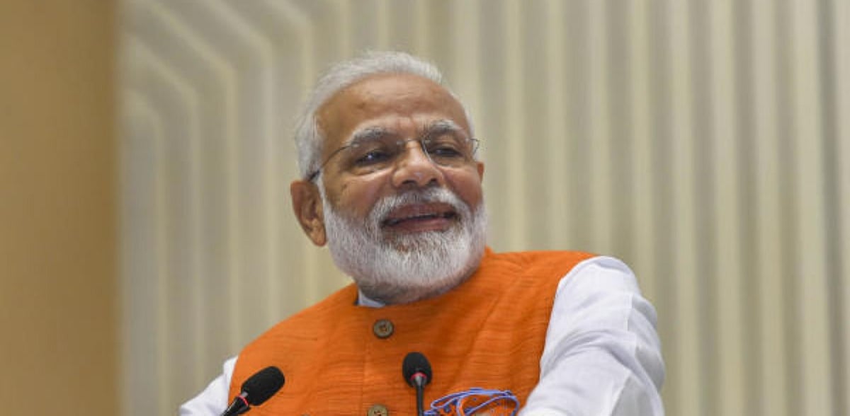 PM Narendra Modi posts video of him feeding peacocks