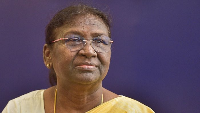 Pharmacist suspended for clicking pictures with President's chopper