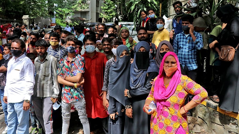 Dilip Kumar buried with state honours in Mumbai; See Pics