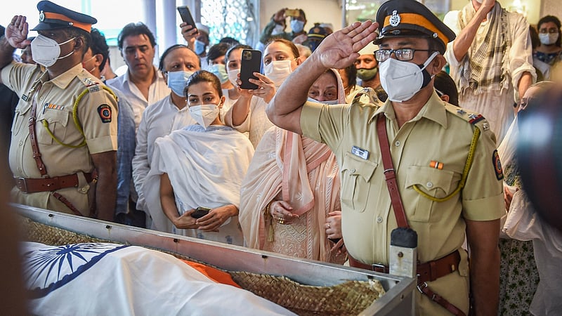 Dilip Kumar buried with state honours in Mumbai; See Pics