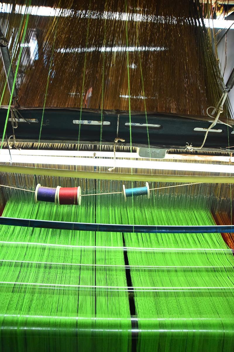Grey stories woven in colourful threads