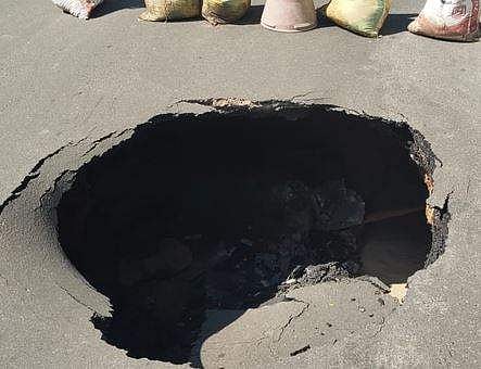 Sudden pothole on the road due to metro rail work