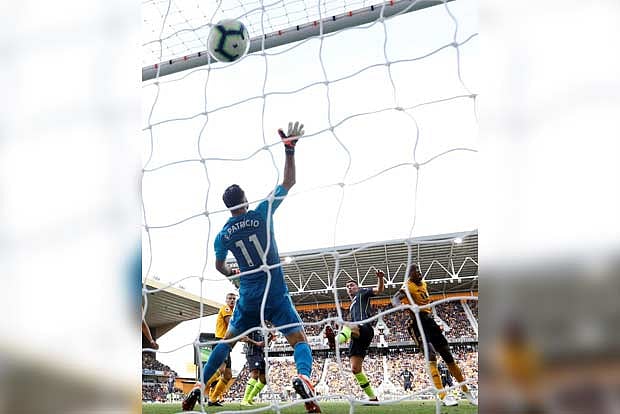 Champions Man City fight back for 1-1 draw at bold Wolves