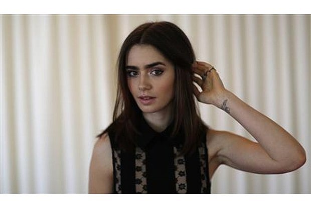 Lily Collins likens shooting 'Emily in Paris' to a 'mini vacation'