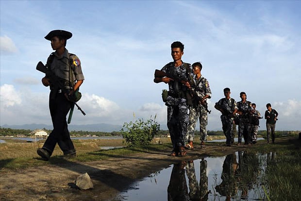 Myanmar forces clash with villagers in delta region, 20 dead