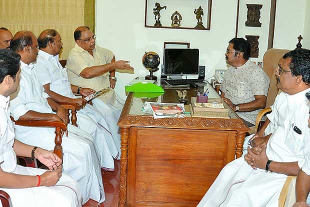Dinakaran goes into a huddle