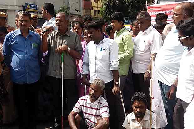 Differently abled agitate in support of transport employees