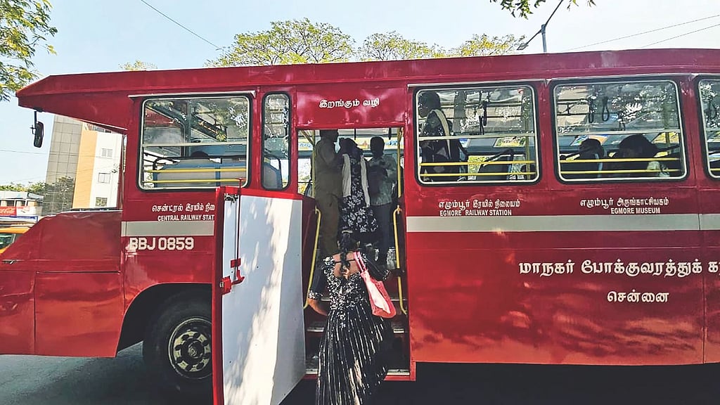 Chennai: Denizens smile while taking an Ula on the red