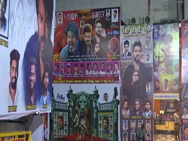 Vijay fans gather outside theatre in Chennai day before release of film ...