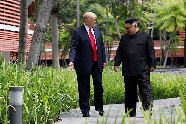 Trump offers to end Korea war games after historic Kim summit