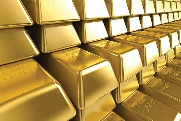 Gold slides on lacklustre demand