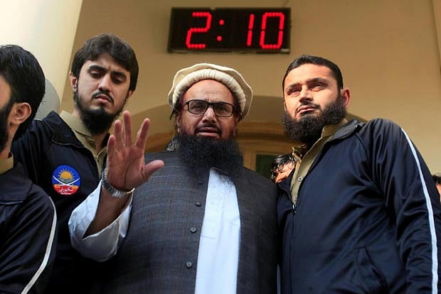Pakistan bans Mumbai attack mastermind Hafiz Saeed-led Jamaat-ud-Dawa ...