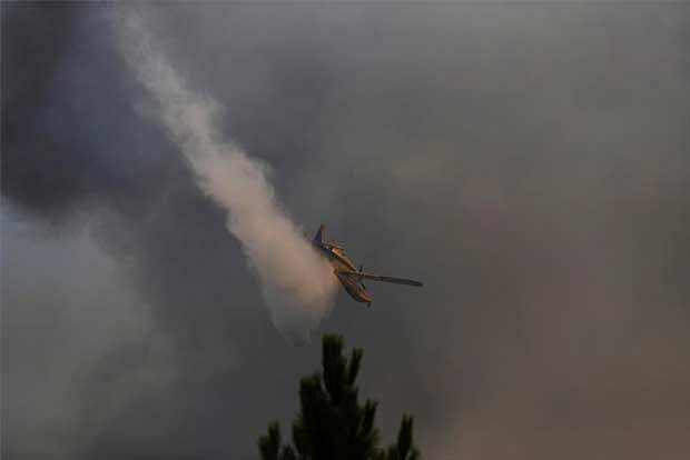Police launch investigation as wildfire sweeps central Portugal