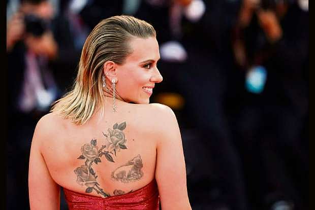 Scarlett Johansson shows off back tattoo