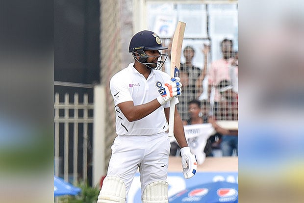 Unstoppable Rohit powers India before bad light, rain force early stumps