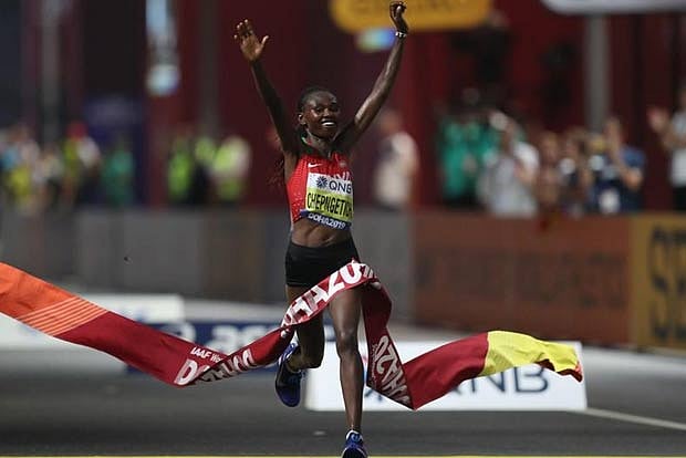 Chepngetich beats heat and humidity to claim women's marathon title at ...