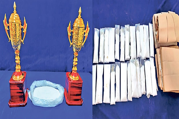 Drugs worth Rs 40 lakh hidden in belts, trophies seized at airport